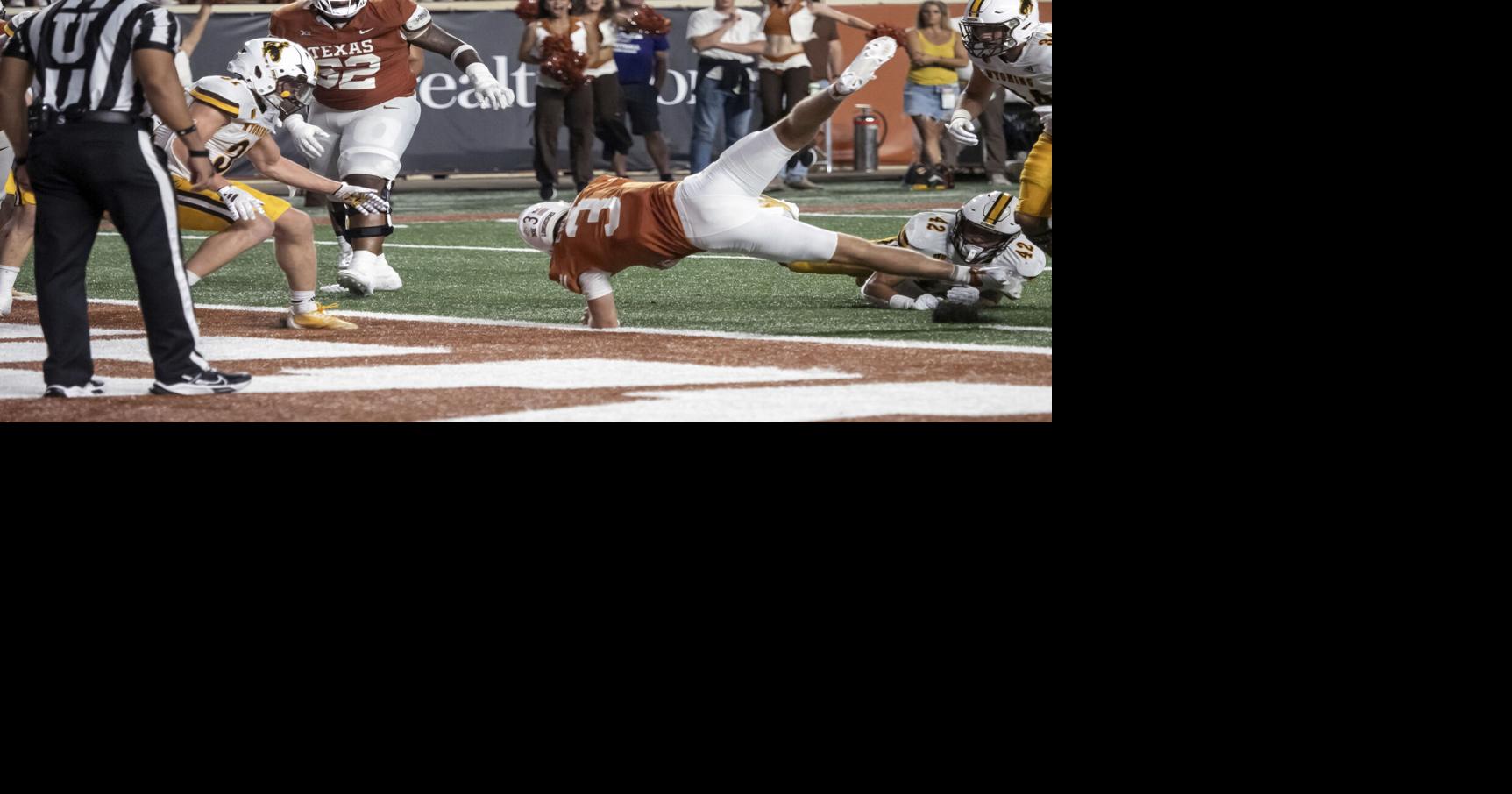 Wyoming battles No. 4 Texas before Longhorns' late surge