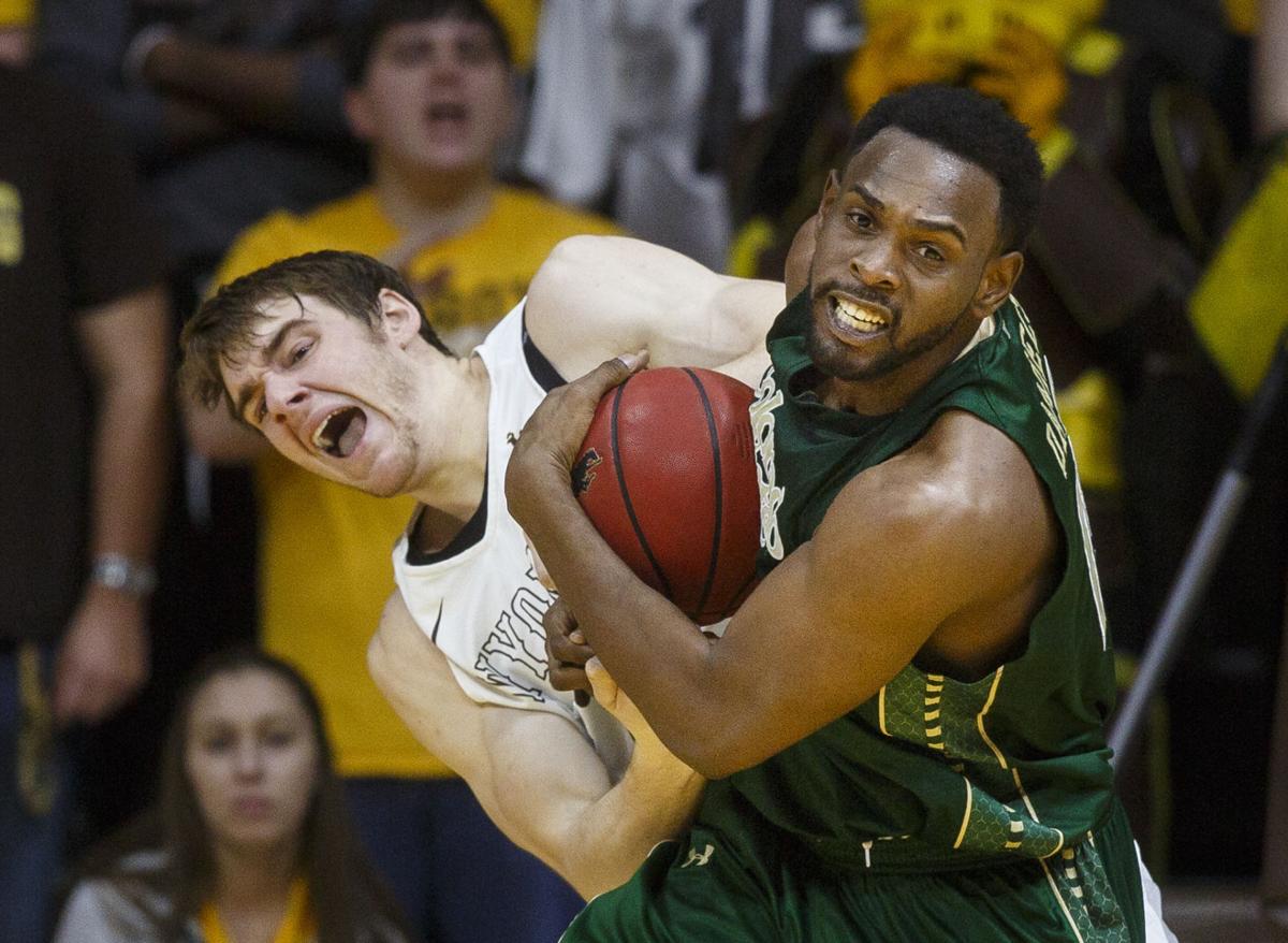 Wyoming foward Jonathan Barnes meets adversity with positivity