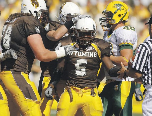 Devin Moore, an unlikely participant in the NFL Combine, bides his time
