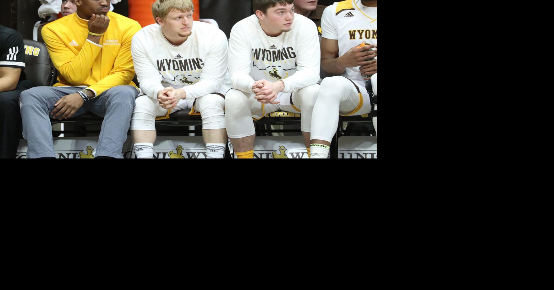 From coach to manager to player, Wyoming's KC Henry is no ordinary walk-on