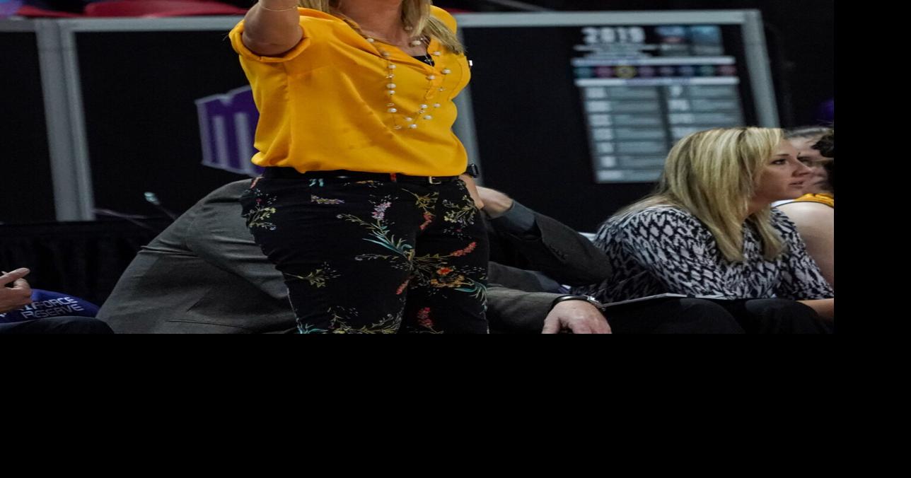 Wyoming head coach Heather Ezell will be back on the bench with ...