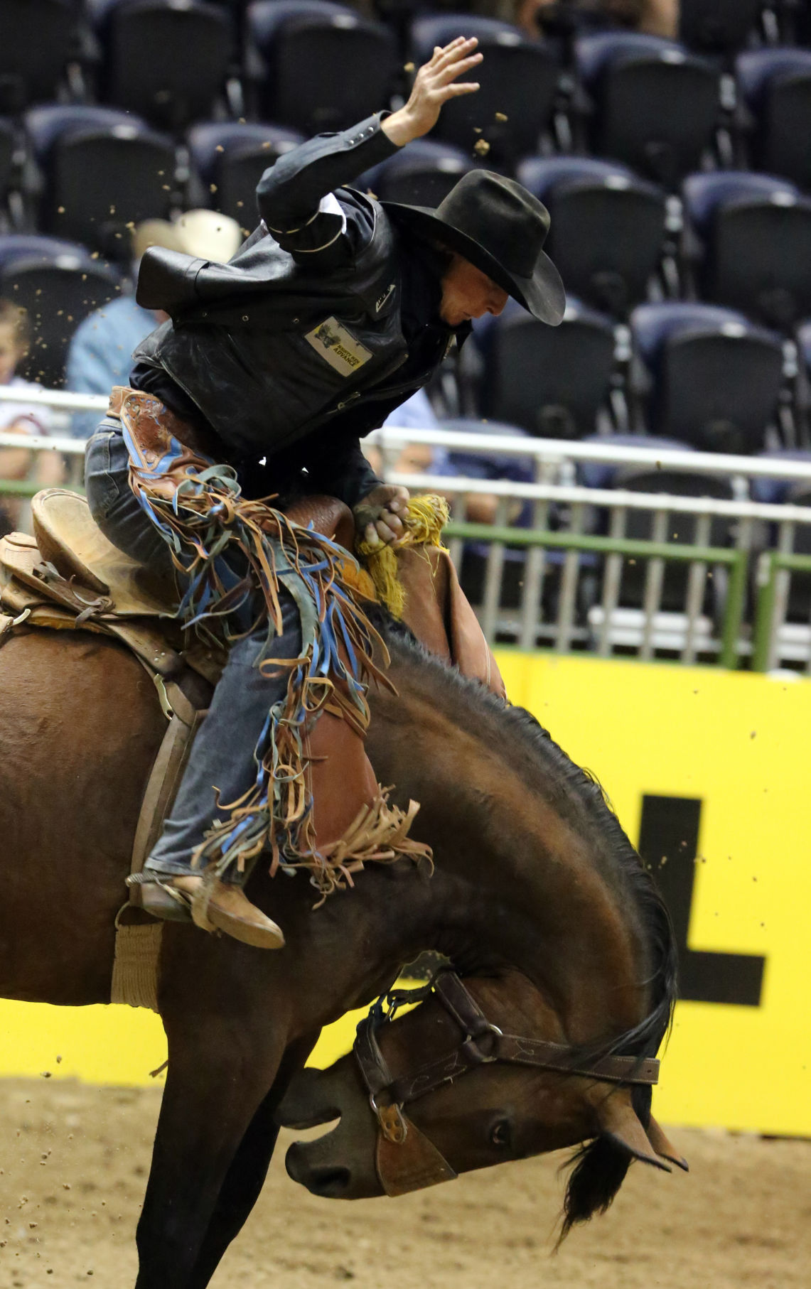 New Mexico Junior College's Preston Burr leads saddle bronc riders ...