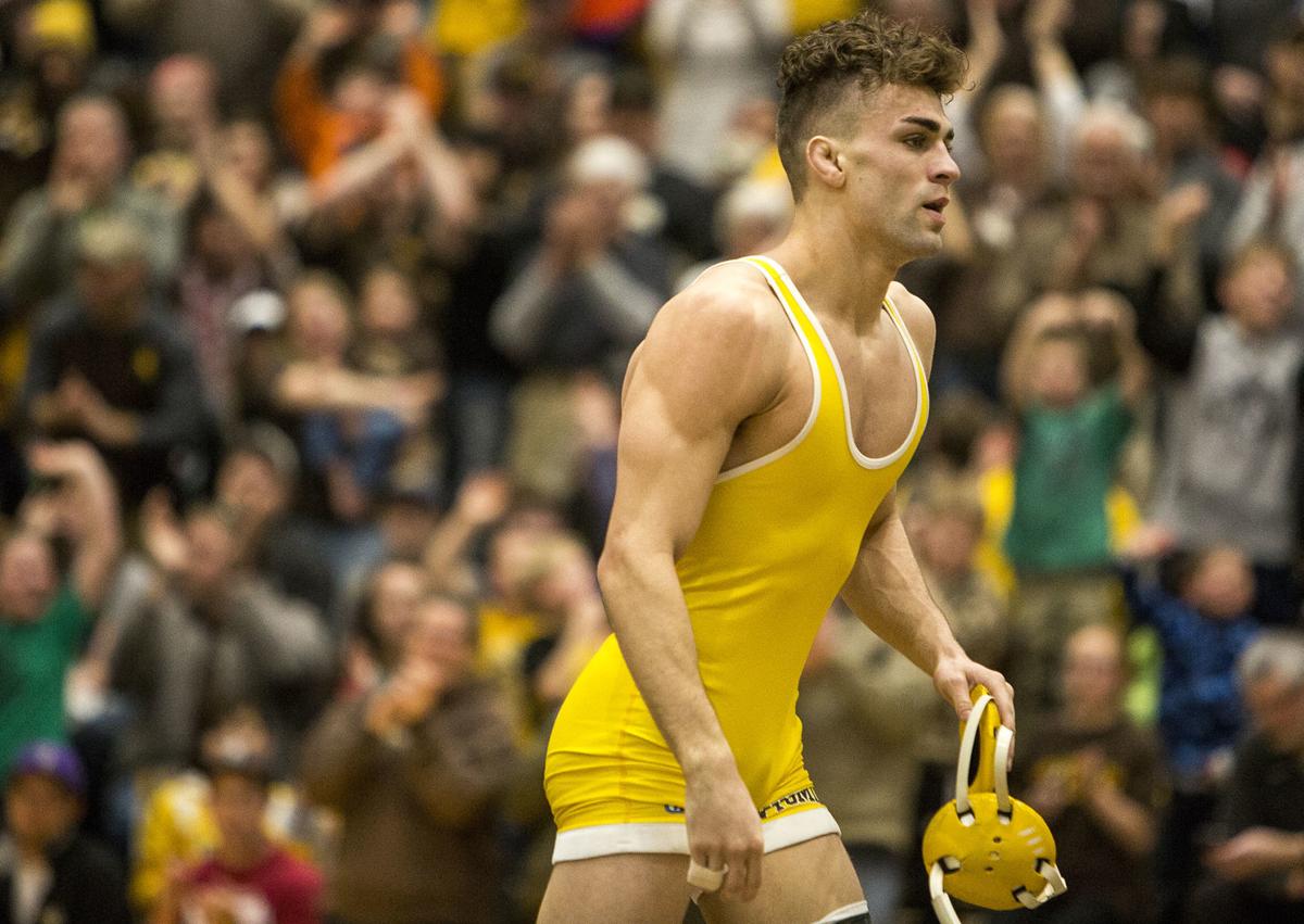 University of Wyoming wrestler Bryce Meredith readies to give his home ...