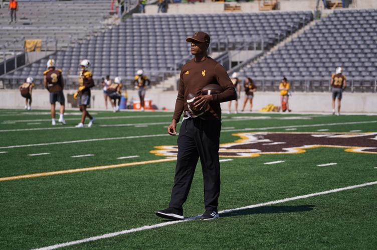 Cowboys elevate Jovon Bouknight to offensive coordinator