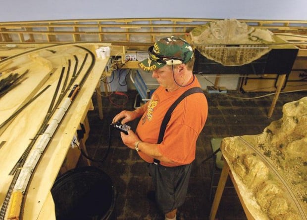 Model railroad collectors create worlds of miniature proportion