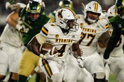 Wyoming looks to get Harrison Waylee more carries