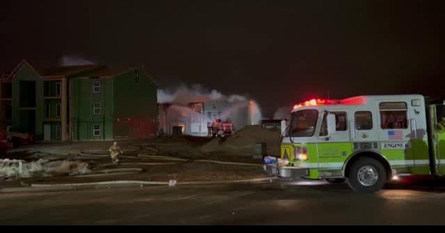 Fire burns apartment complex in Mills