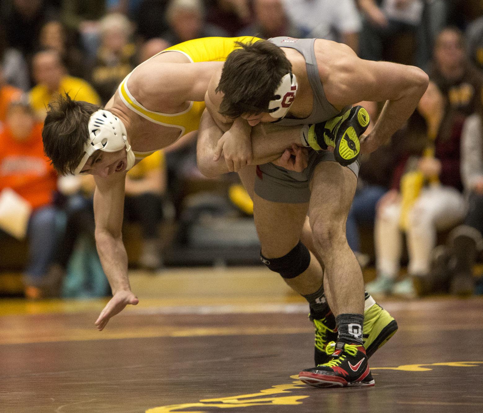Photos: Wyoming and Oklahoma face off in Sunday afternoon wrestling duel