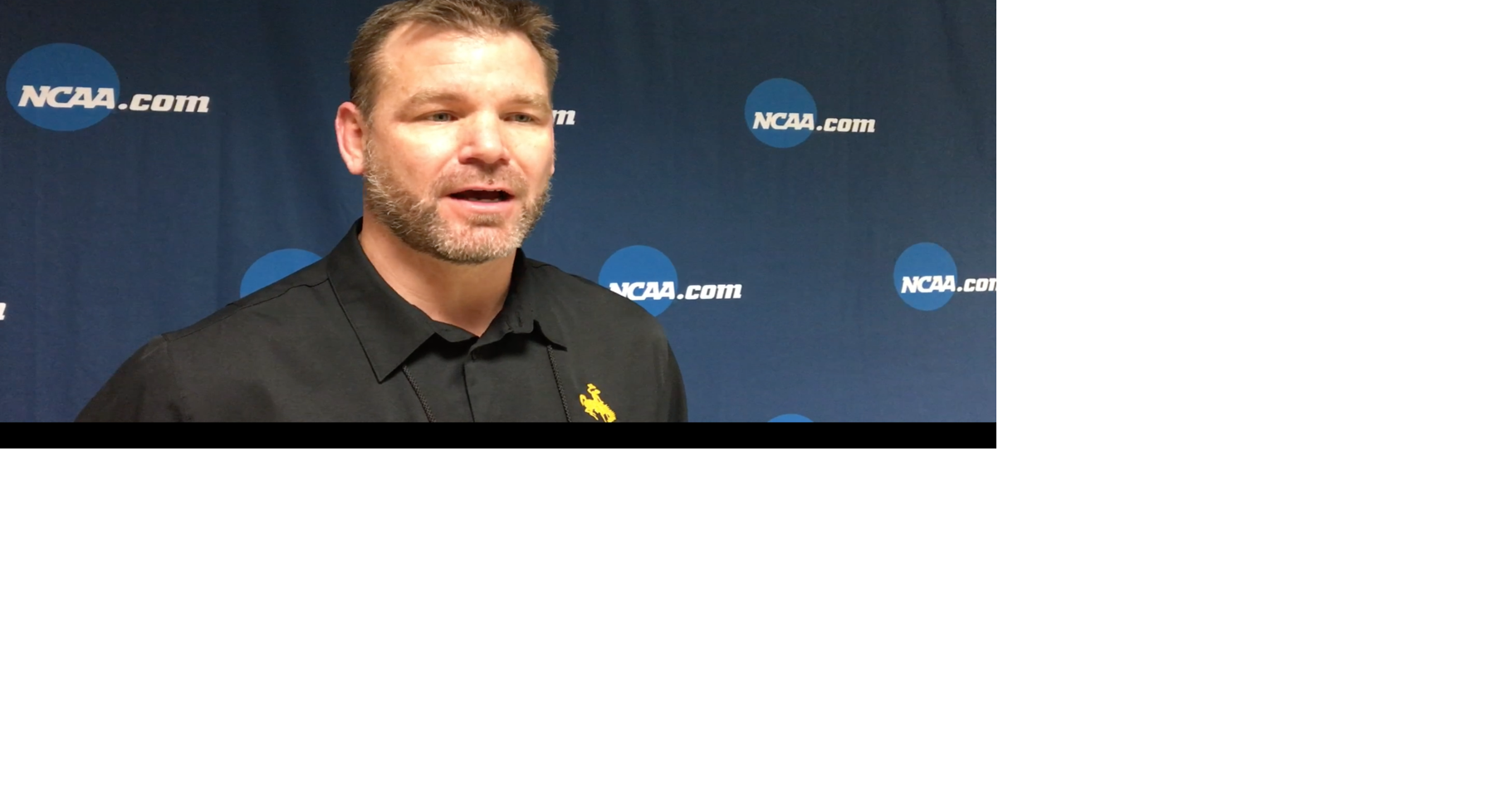 Wyoming wrestling coach Mark Branch speaks after Day 1 at nationals