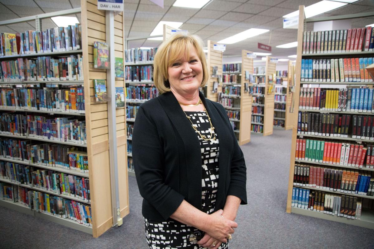 New library director looks to maintain in downturn