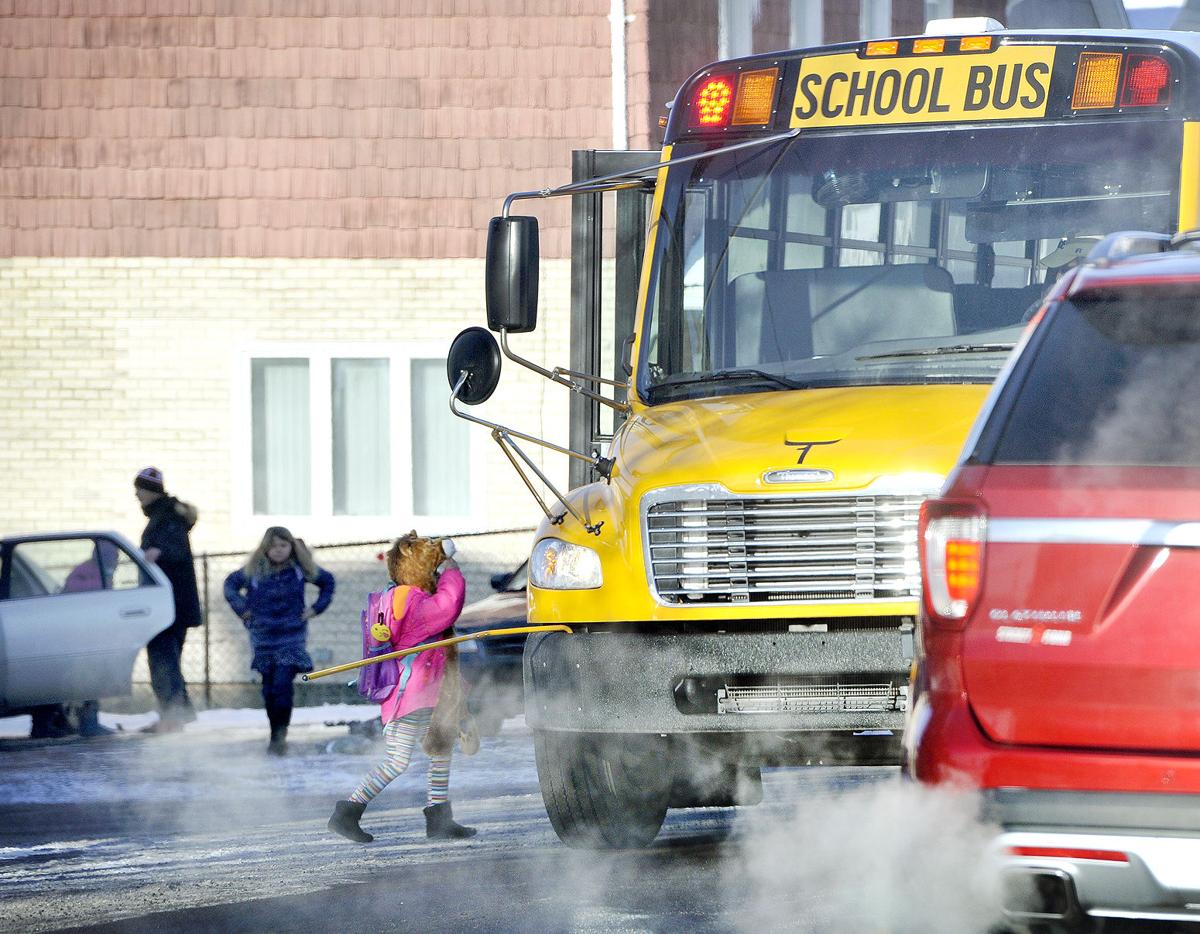 Too cold to go to school? Districts take steps to address student ...