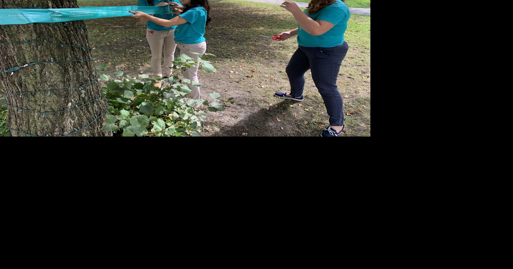 Bishop McCort students tie teal ribbons to raise ovarian cancer ...