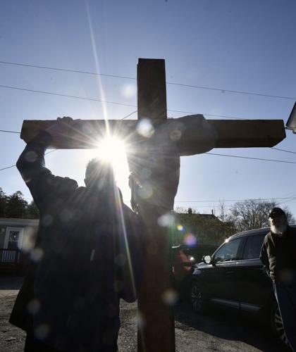'The true meaning of Easter': Christians carry crosses in area Good ...