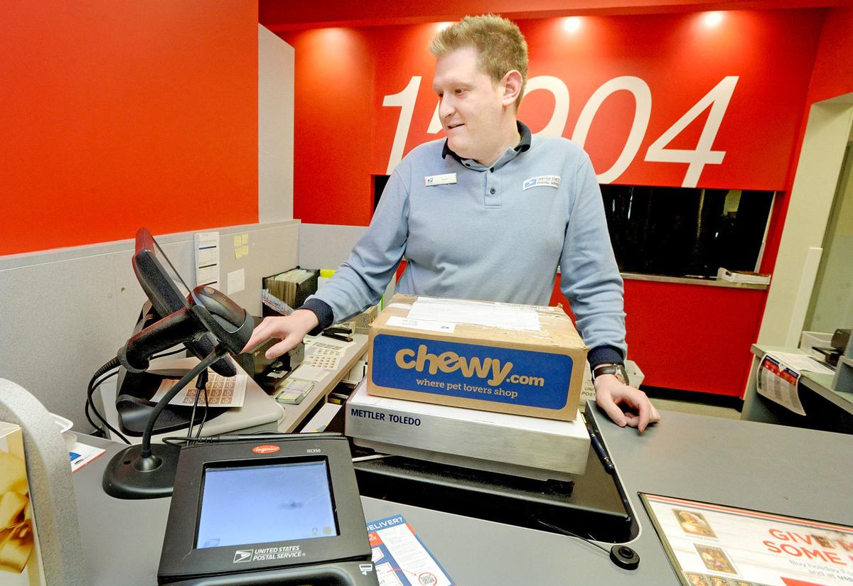 Package deal: Postal workers know holidays bring busy shipping season ...