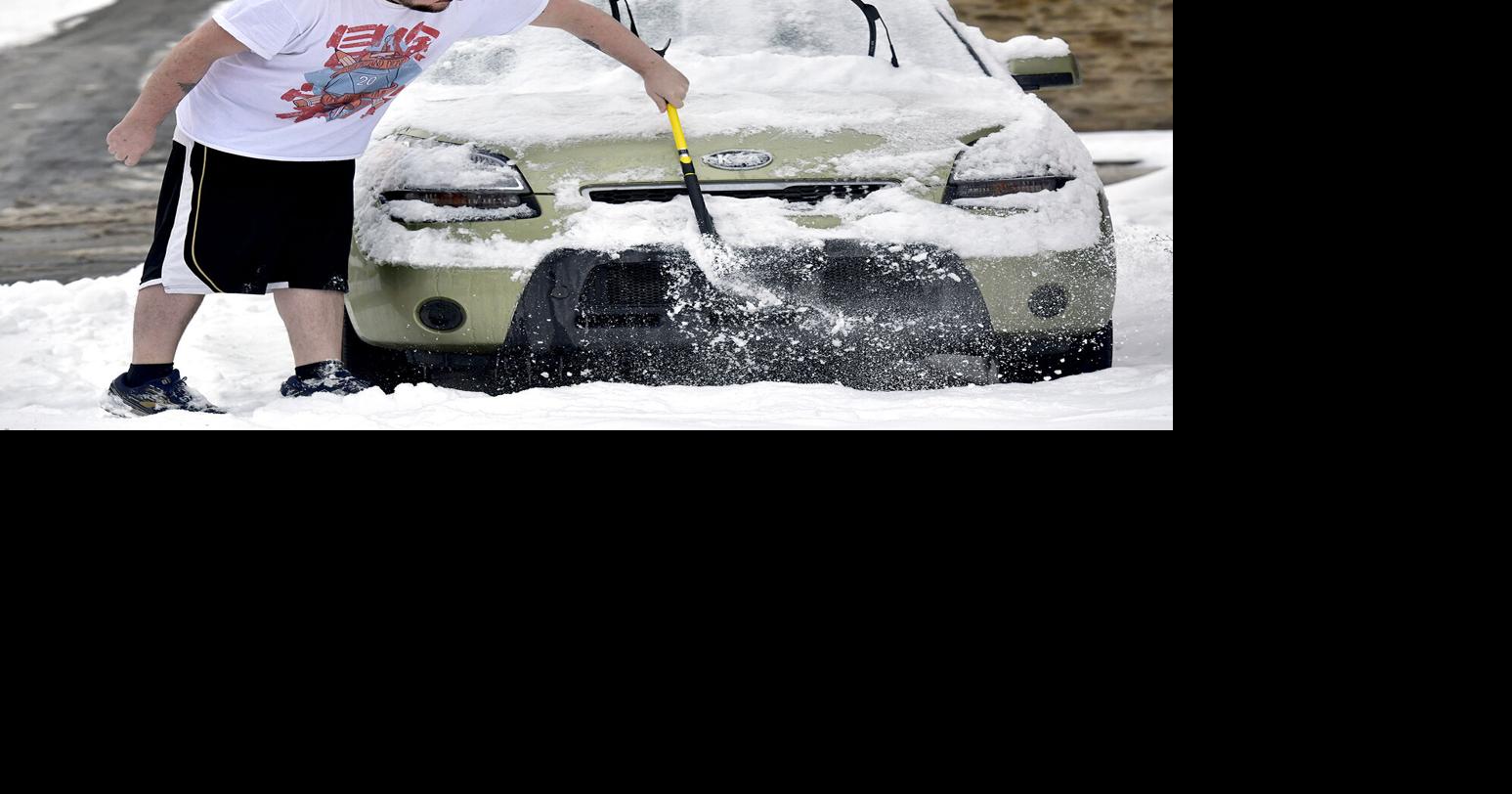 Brushing off the car ... again | News | tribdem.com