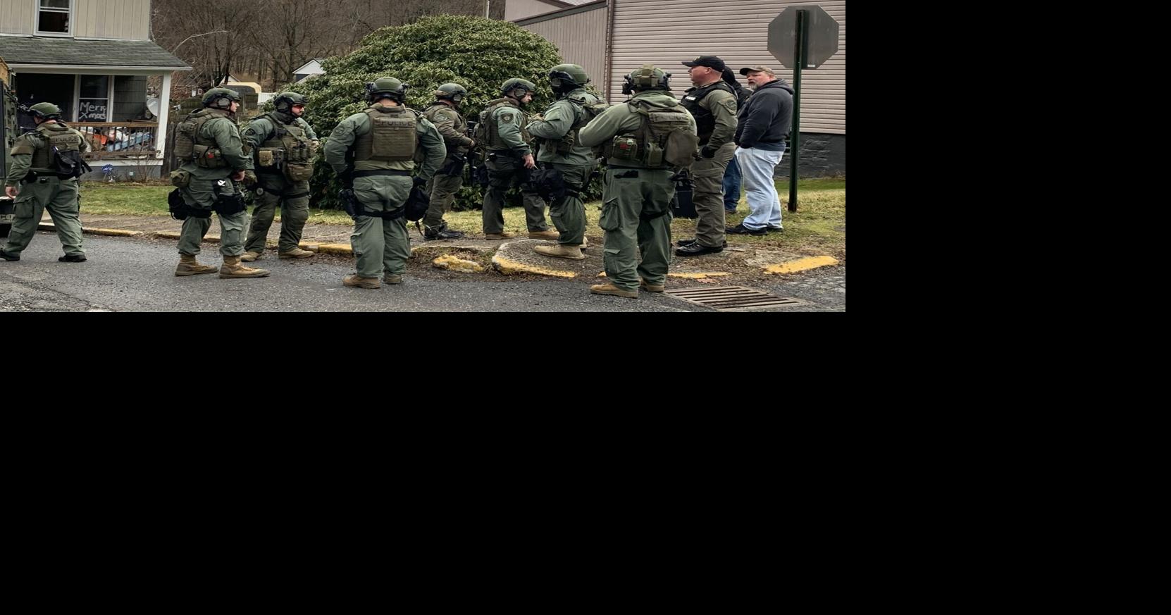 Police flock to Brownstown in hunt for man amid fears of 'cache of ...