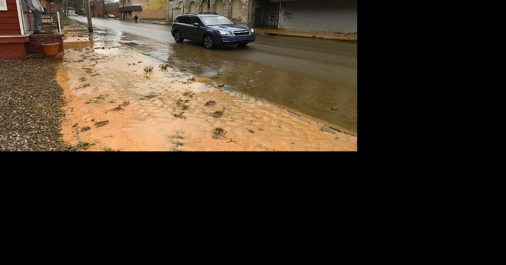 PHOTO GALLERY | 'Finally broke loose': Hillside runoff floods part of ...