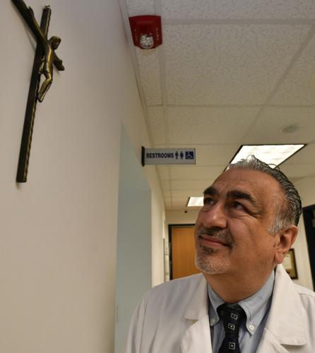 'Man on the cross': Johnstown doctor keeps crucifix close in his work ...