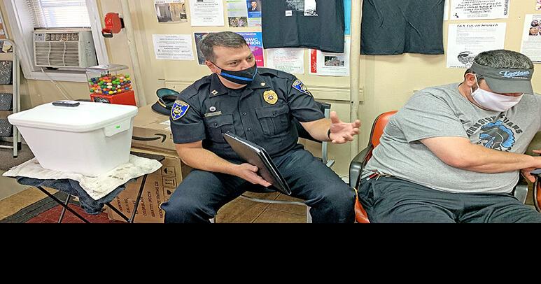 WATCH VIDEO | City cops meet with locals at barbershop | News | tribdem.com