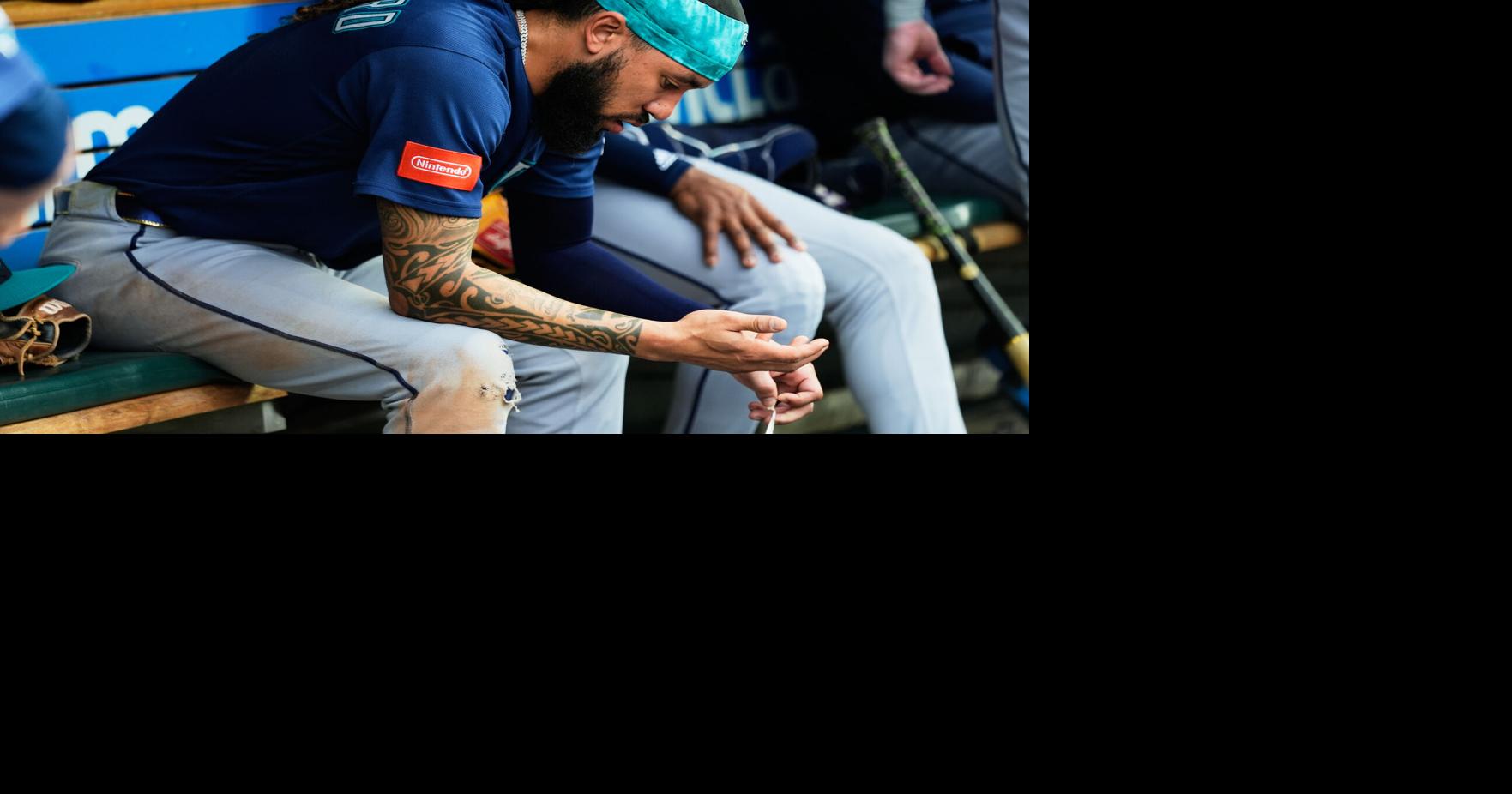 Mariners place shortstop J.P. Crawford on injured list with right hand ...