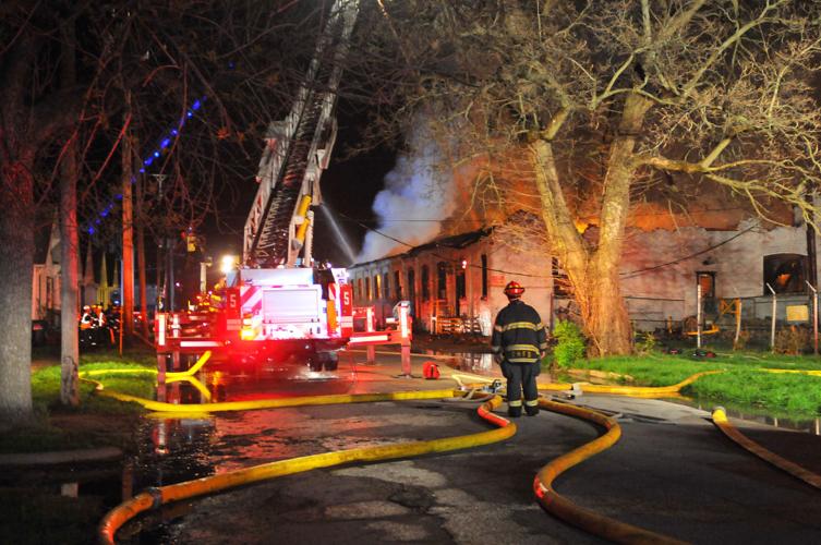 VIDEO: Fire engulfs northside warehouse; suspect detained | Local News ...