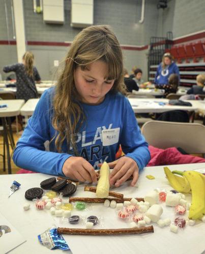 Students learn about engineering while building edible cars | Local ...