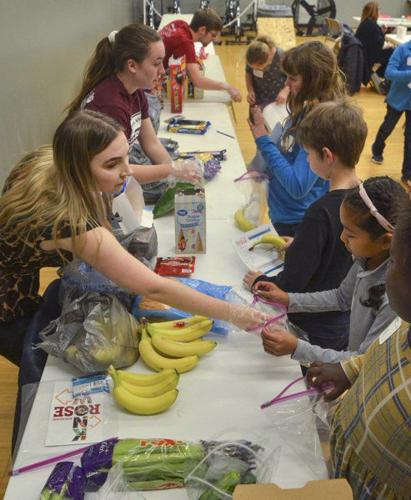 Students learn about engineering while building edible cars | Local ...
