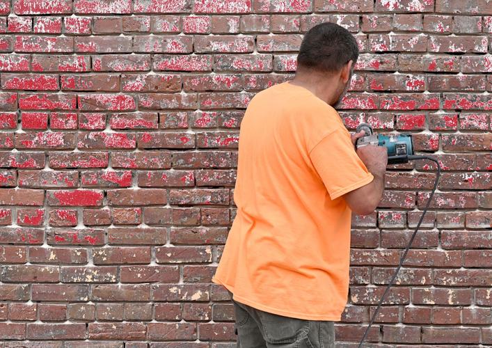 Mark Bennett: Wall repairs cause Coca-Cola mural's noticeable absence ...