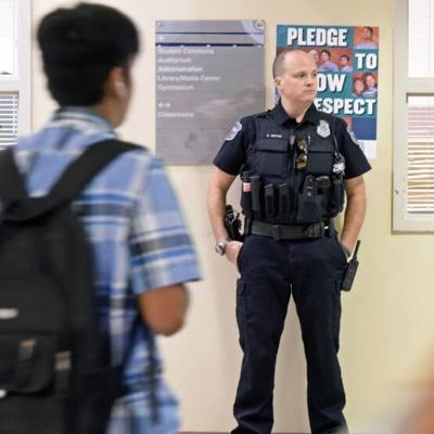 City/APS ink deal for high school liaison officer | News ...