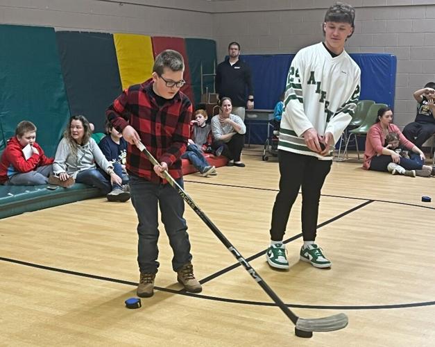 AHS hockey players show up for new Pied Piper PE program | News ...