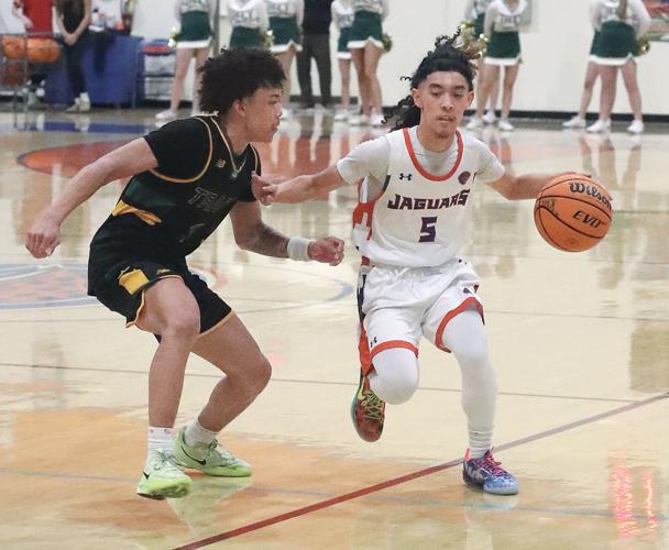 Boys basketball: Russell erupts for 34; Tracy spoils Jags' senior night ...