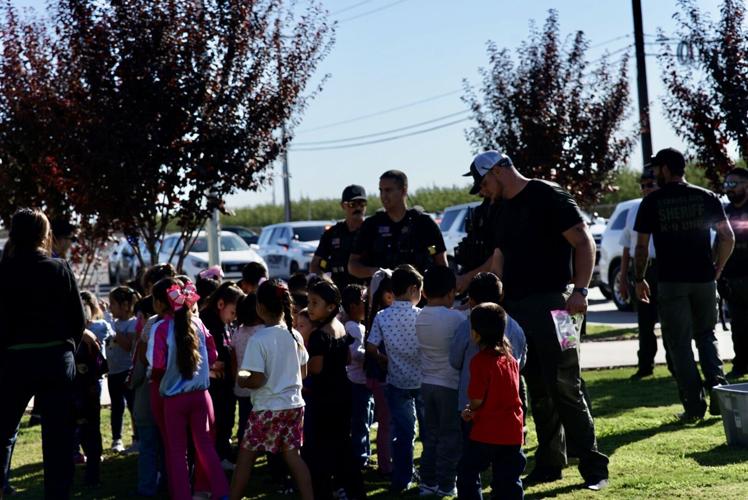K9 units donate school supplies | Patterson Irrigator — Community ...