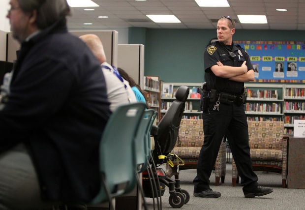 Guards, police keeping order at PIma County libraries for $750K a year