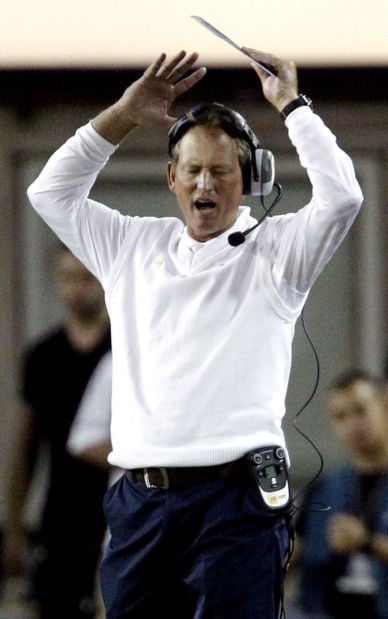 Neuheisel a natural at broadcasting, but desire to coach looms