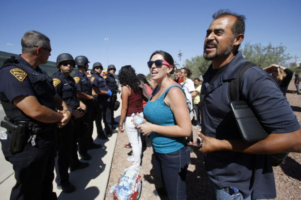 Visiting Kenyan journalist says Tucson police showed restraint at protest