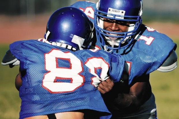 The crooning carrier: Running back McCuin's pre-game performances keep ...