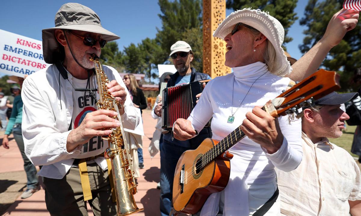 Photos: Thousands protest President Trump in Tucson