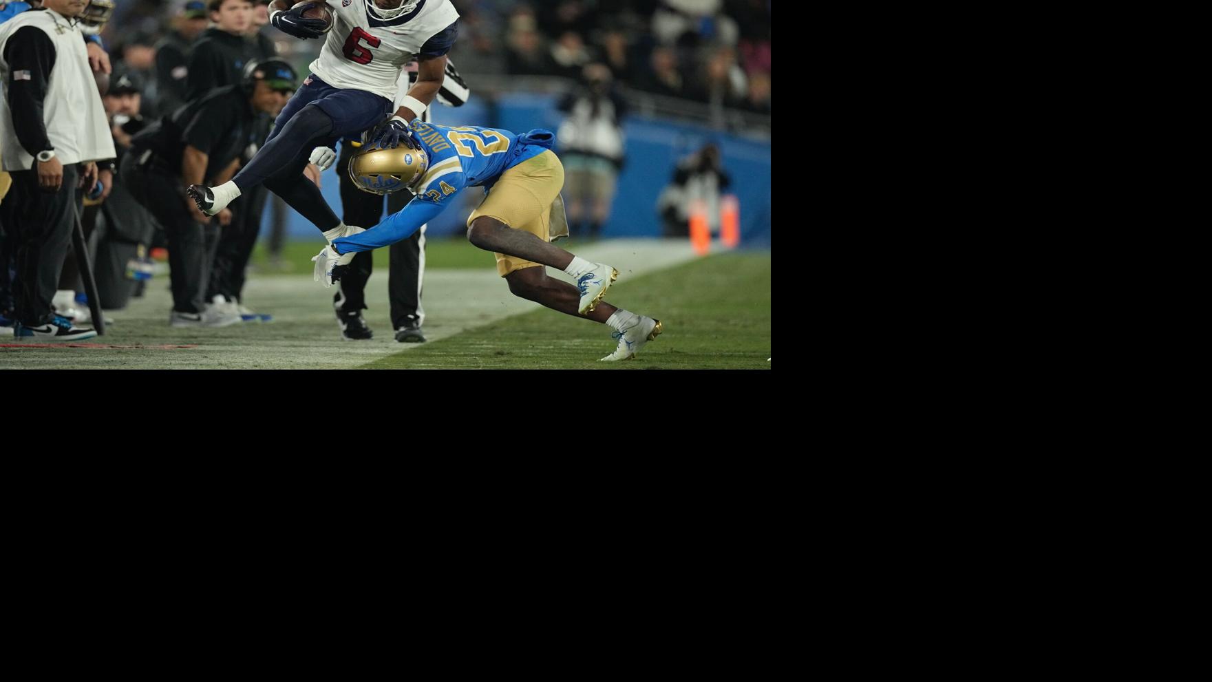 Arizona leads No. 12 UCLA 21-14 at halftime; Michael Wiley has pair of ...