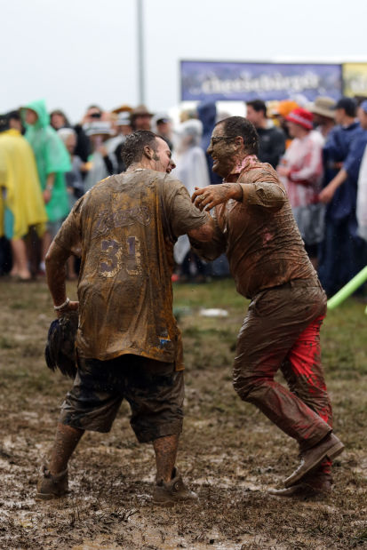 Photos: Kentucky Derby: Fun in the mud | Sports | tucson.com