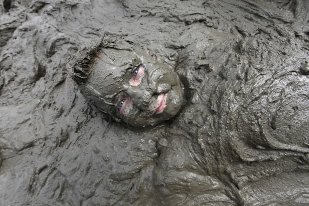 Photos: Mud Day looks fun for mudders, not mothers doing laundry ...