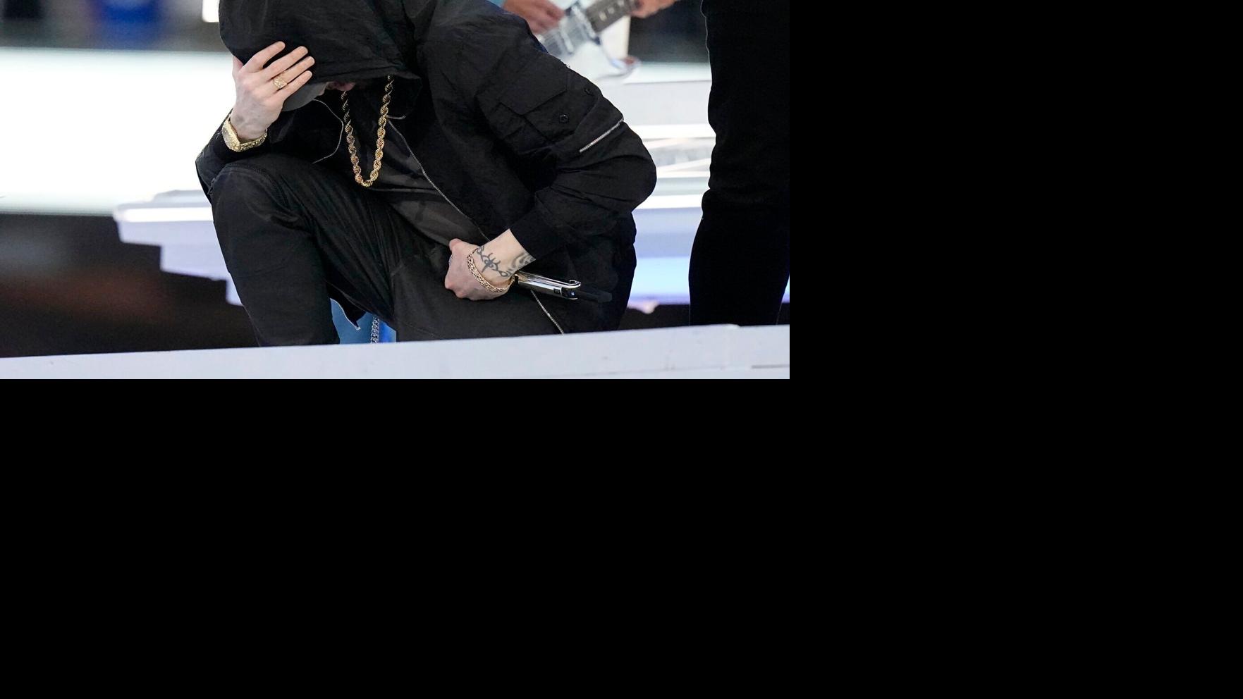 Eminem takes a knee during halftime show; NFL denies reports it tried ...