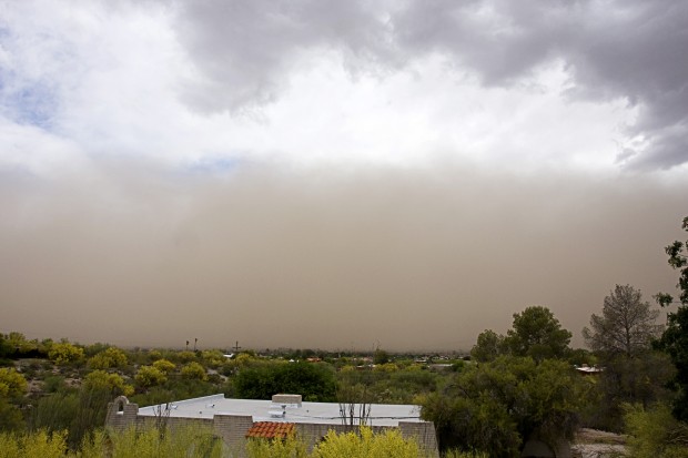 Photos: Dust storm rolls across Tucson