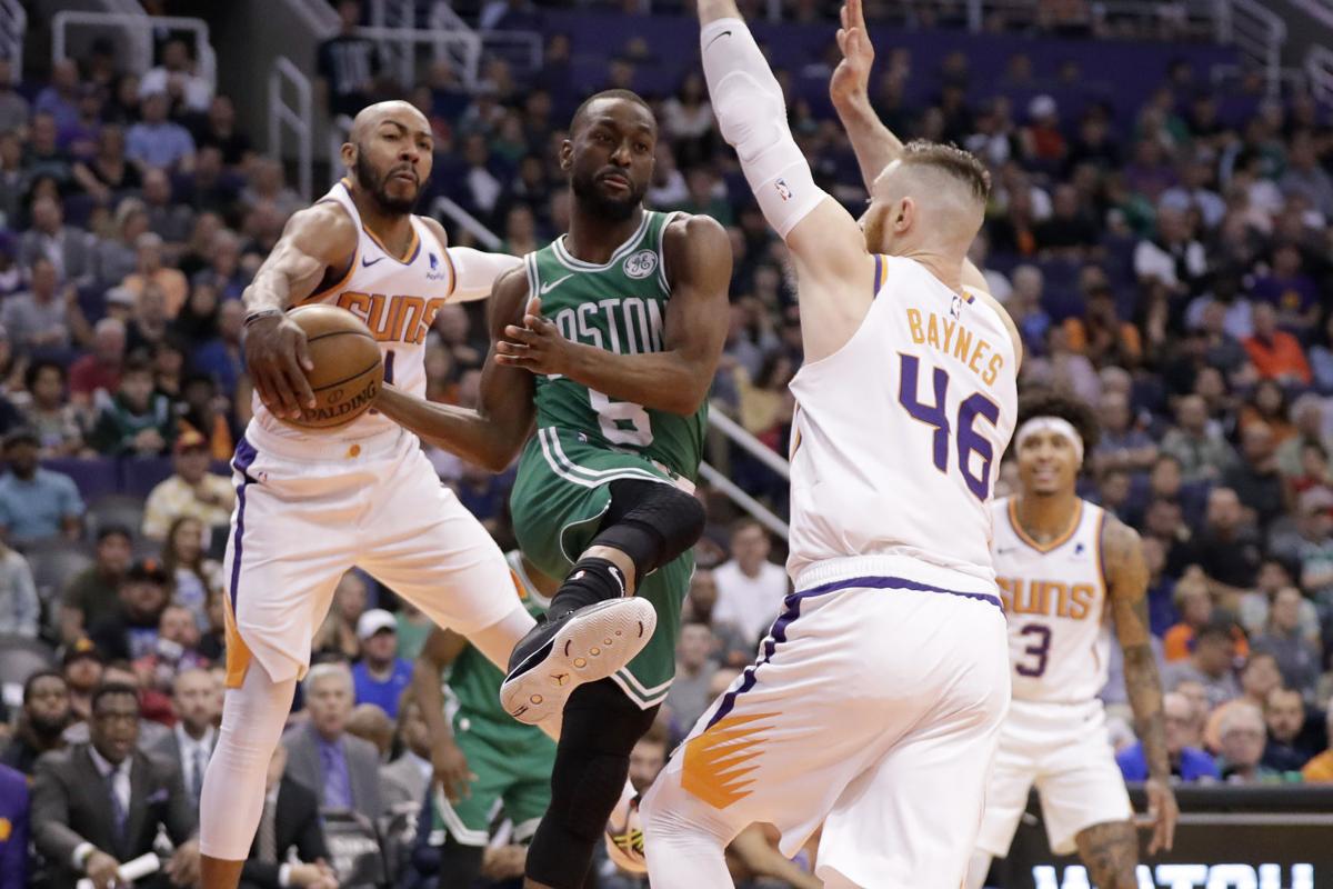 Celtics take control in first half, beat host Suns by 14