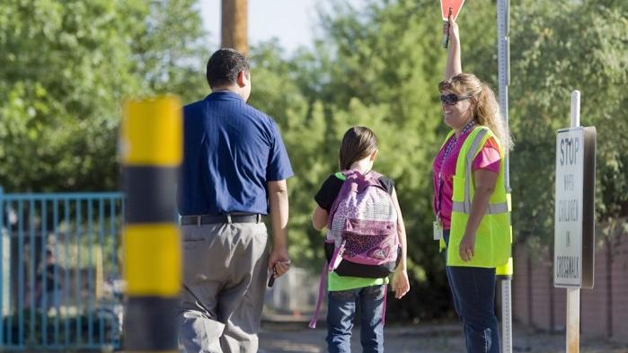 Crossing guard honored as unsung hero