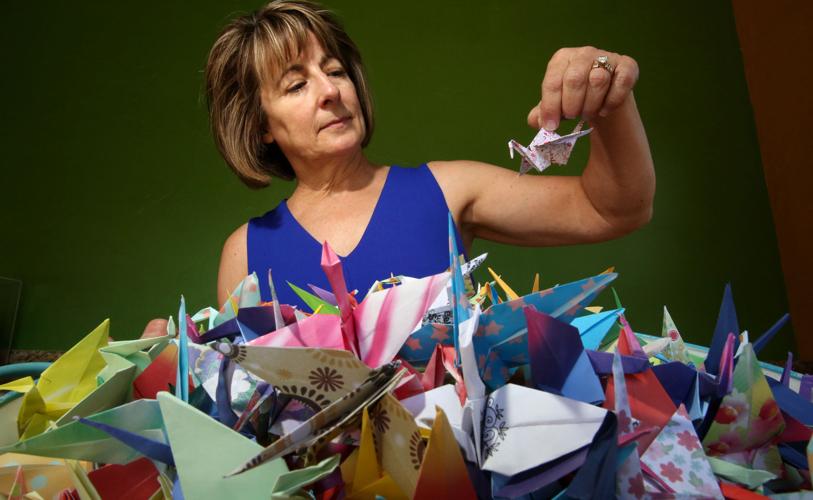 A thousand origami cranes grace Beads of Courage exhibit | Local news ...