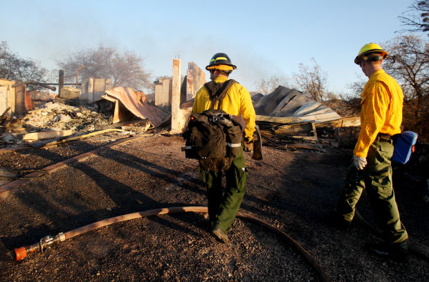 Oracle brush fire destroys house, sheds