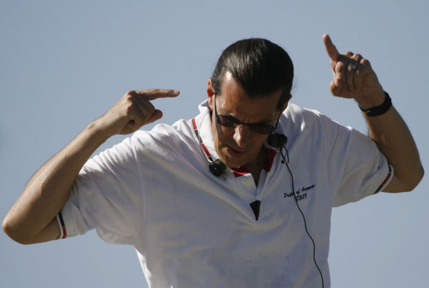 UA band leader marching off to Miami