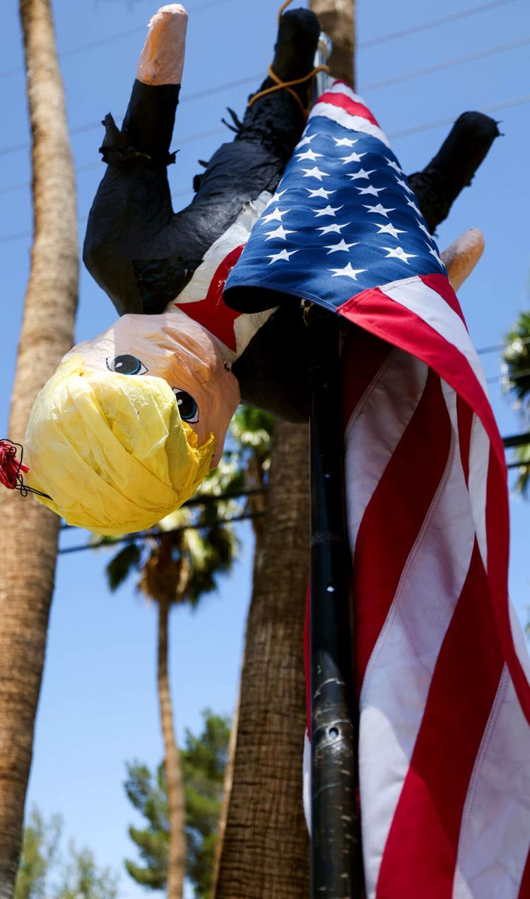 Photos: Thousands protest President Trump in Tucson