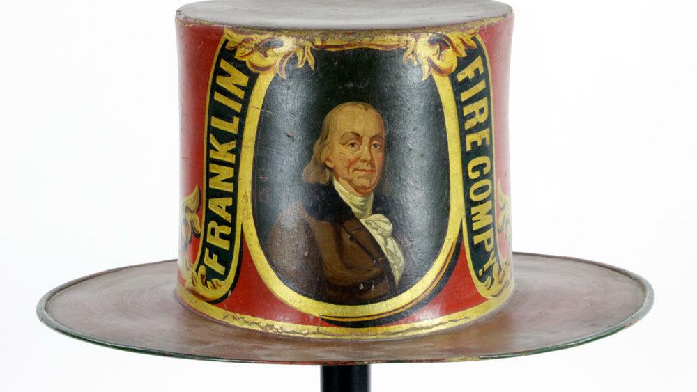 Colonial-themed firefighter's parade hat soars above auction estimate