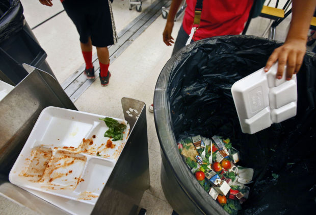 Amphi MS thinks green, recycling lunch trays